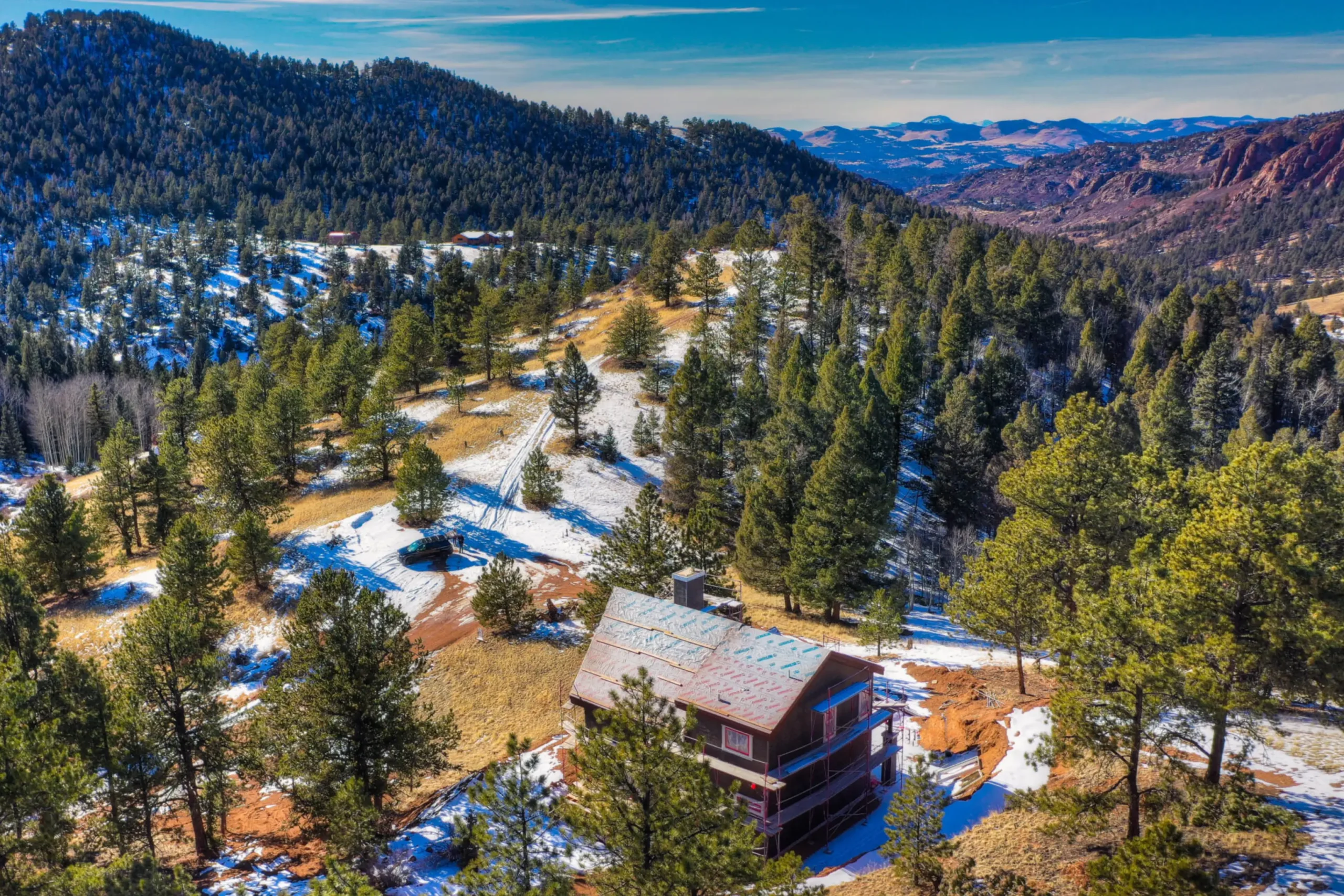 Building in Colorado: Mountain Views vs Valley Locations Guide